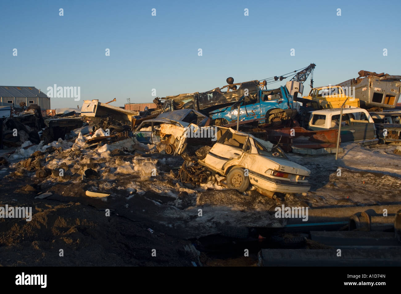 junkyard in the Inupiat village of Point Barrow along the Arctic coast ...