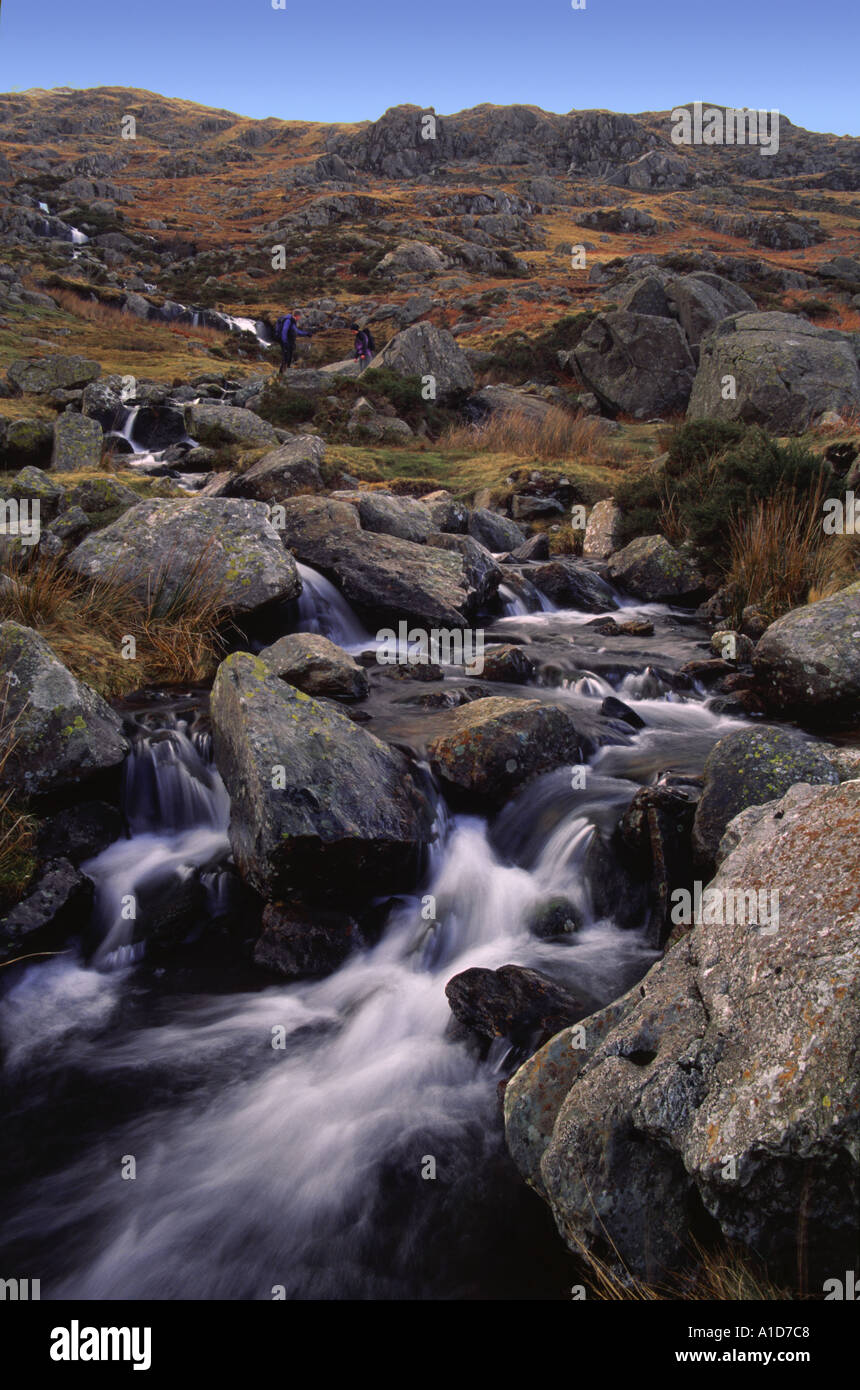 Walkers Crossing Mountain Stream on Carneddau Slopes, Ogwen Valley ...