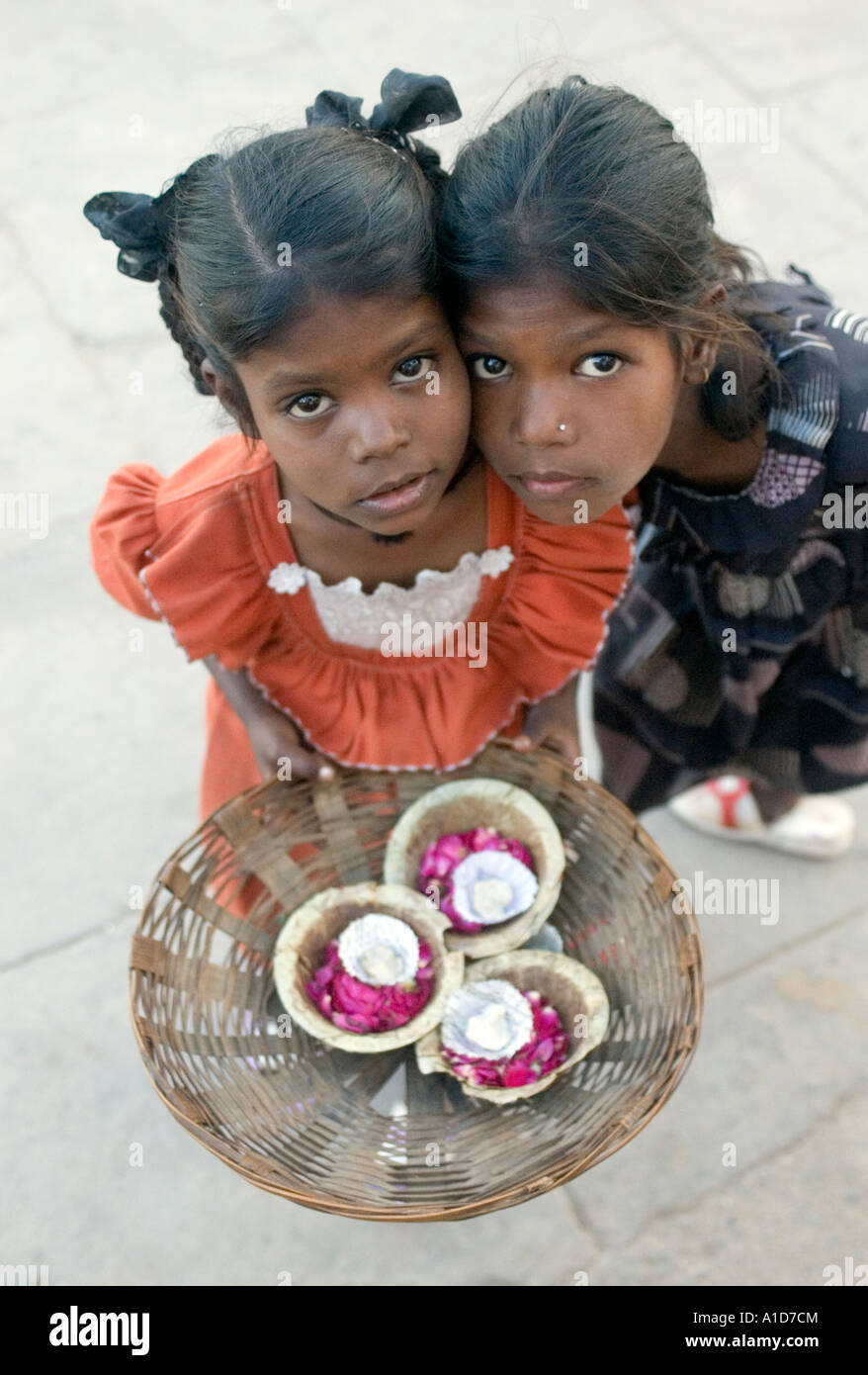 Girls on the ghats by the Ganges river in Varanasi Uttar Pradesh India ...