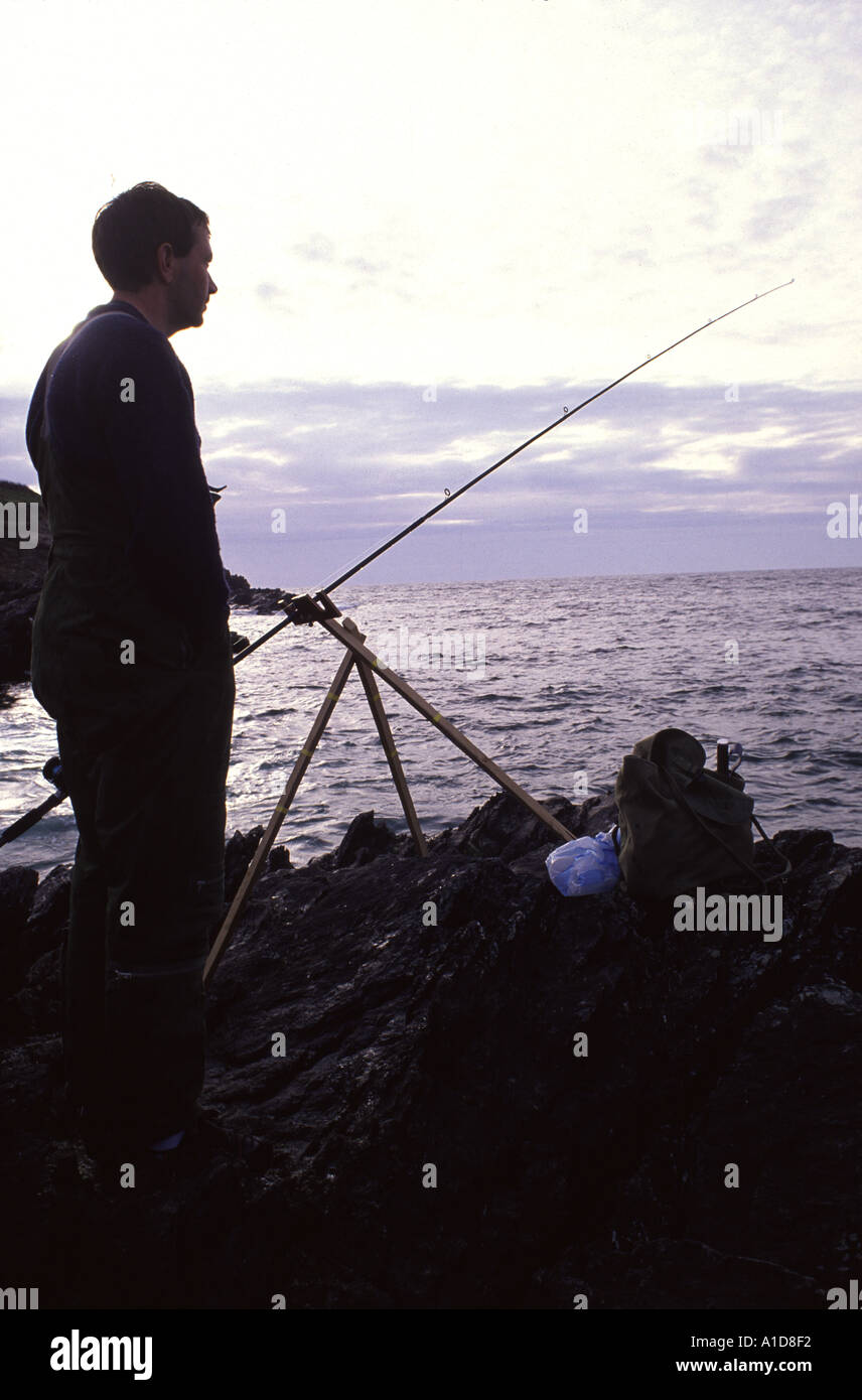 Sea Fishing from rocks Cornwall UK Stock Photo - Alamy