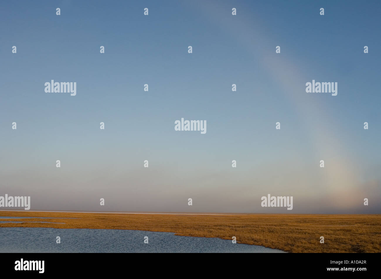 rainbow and a freshwater lake outside the Inupiat village of Point ...