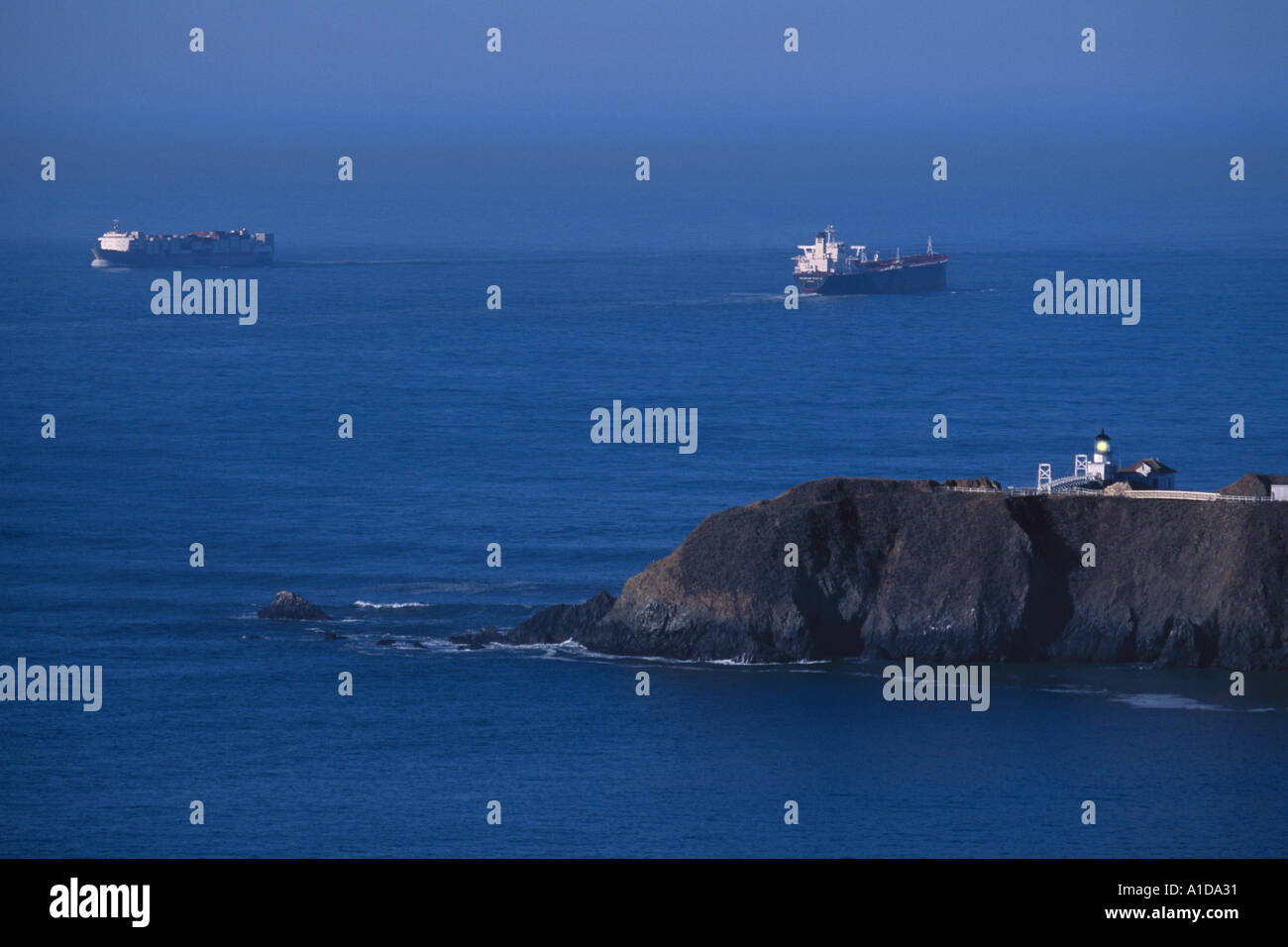 Ships pass Point Bonita Lighthouse on Pacific Ocean at entrance to San ...