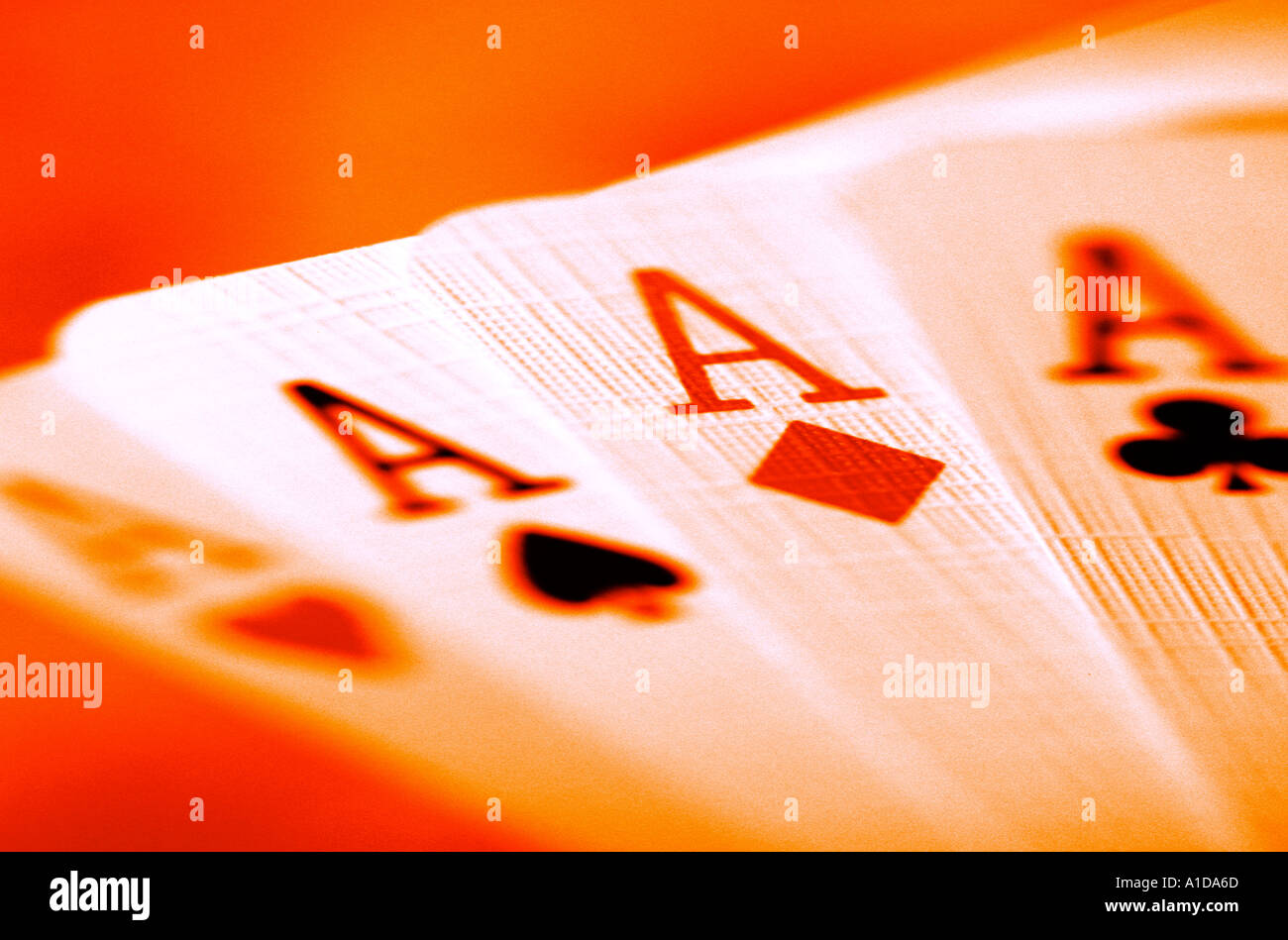 Four aces playing cards hand Stock Photo - Alamy