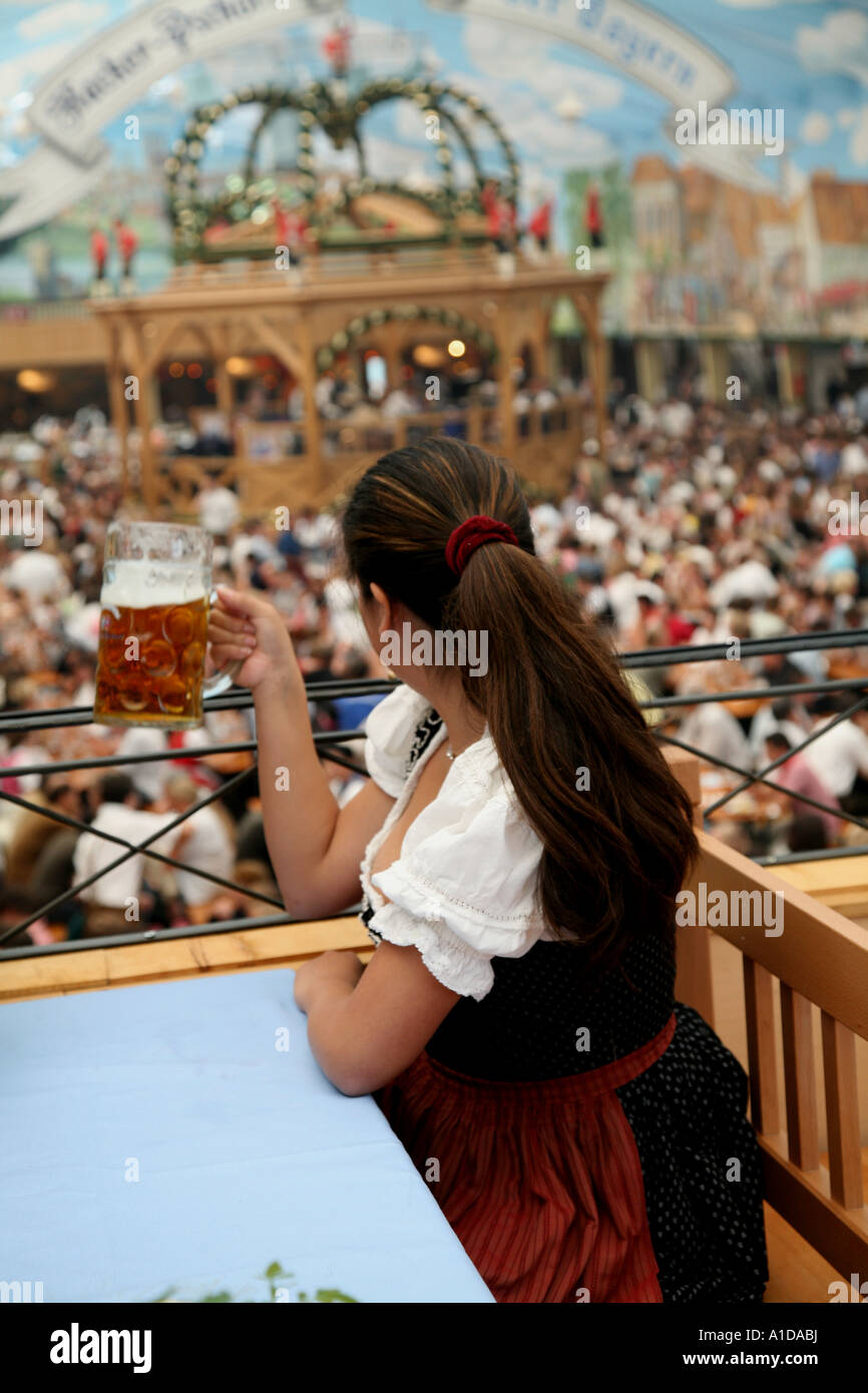 Girl in original beautiful Dirndl dress at Oktoberfest in Munich ...