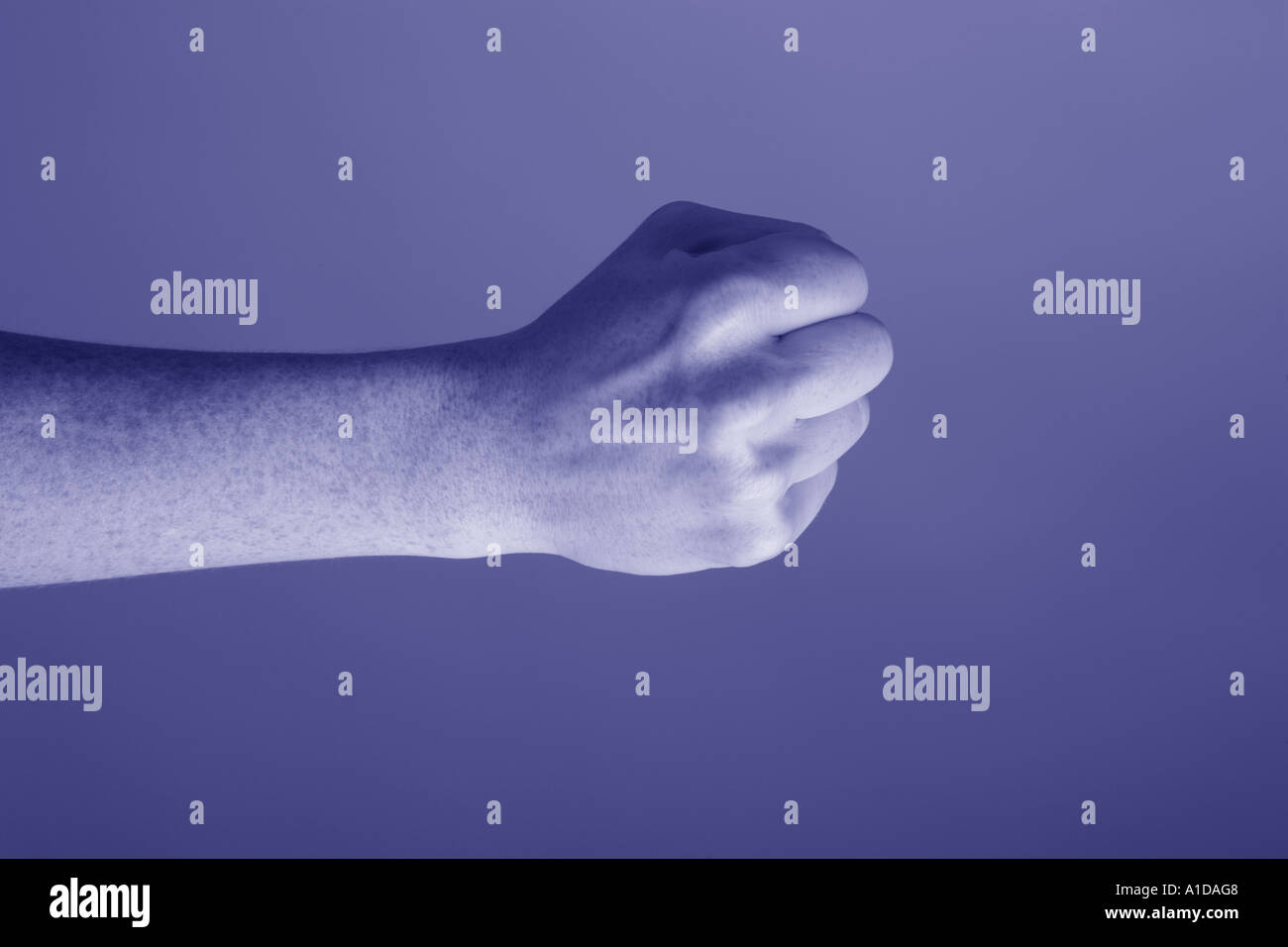 Hand making a fist Stock Photo - Alamy