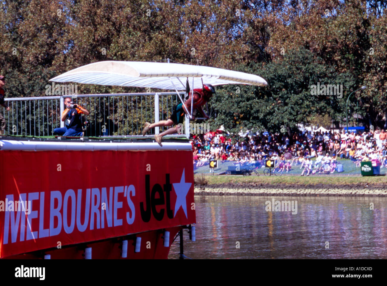 A competitor launches in to the air during the birdman competition ...