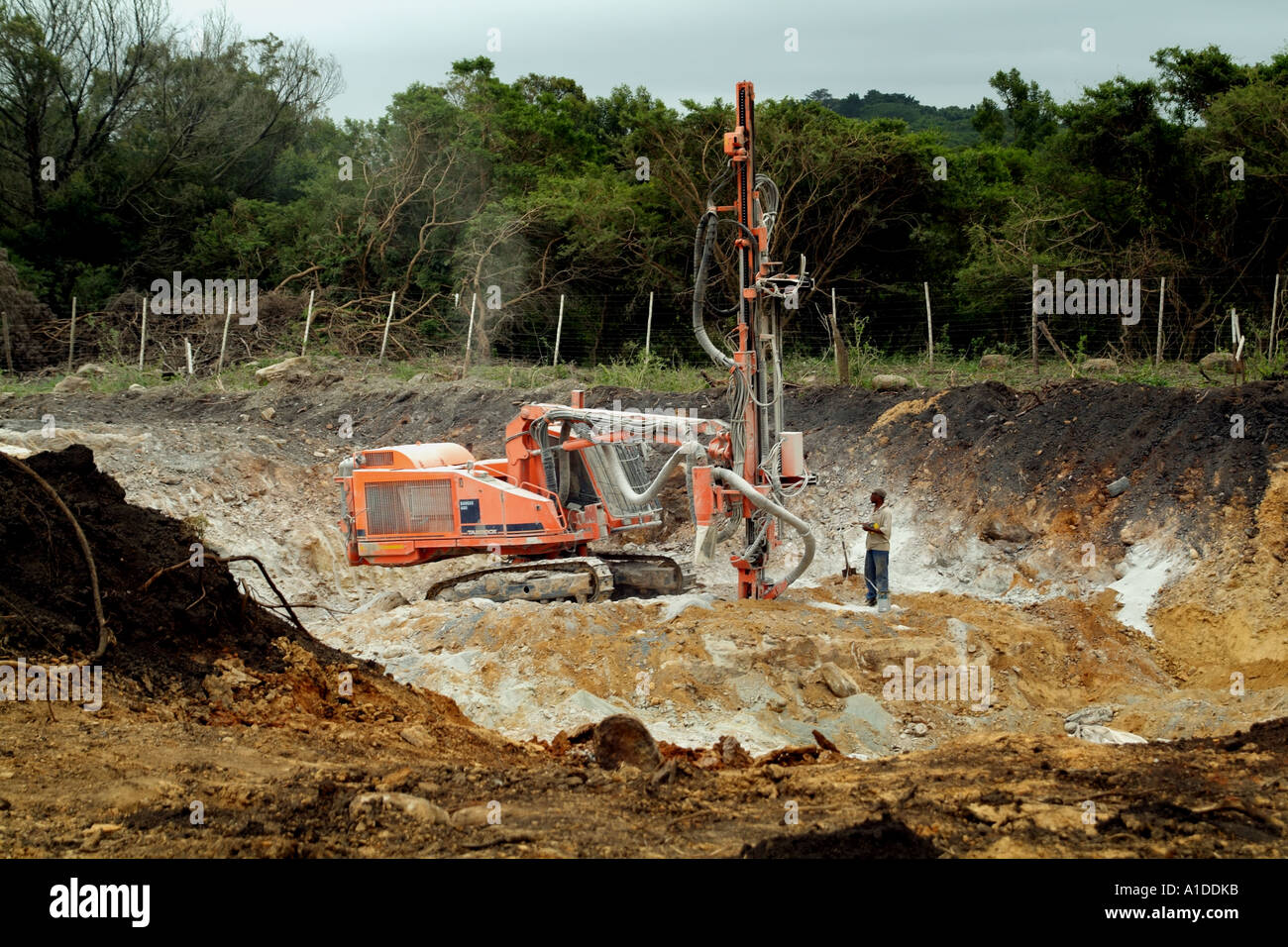 Highway construction working drilling before blasting rock Eastern Cape ...
