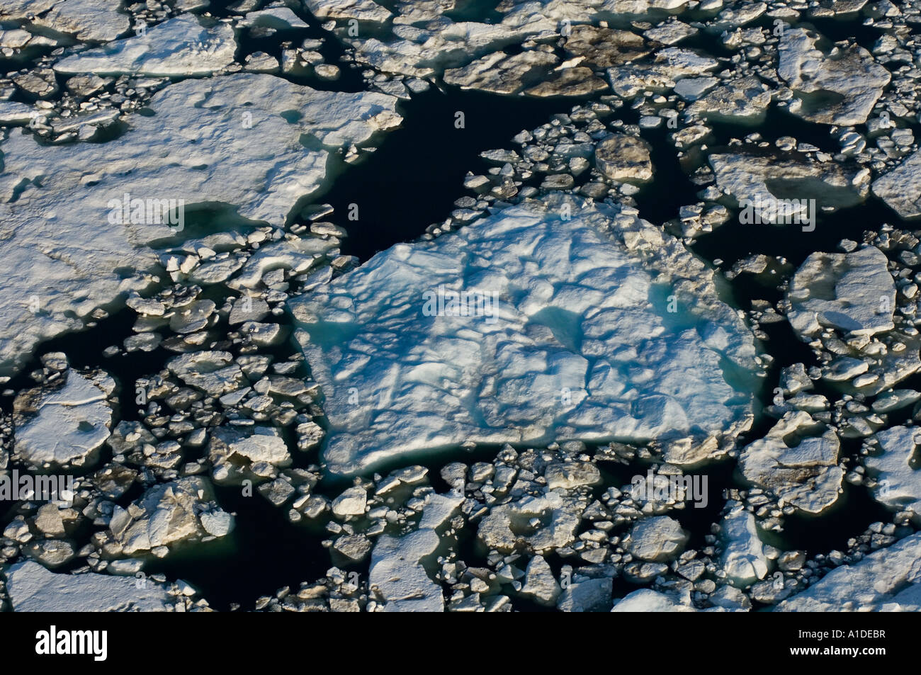 aerial of multi layer ice freshwater pans during spring breakup off the ...