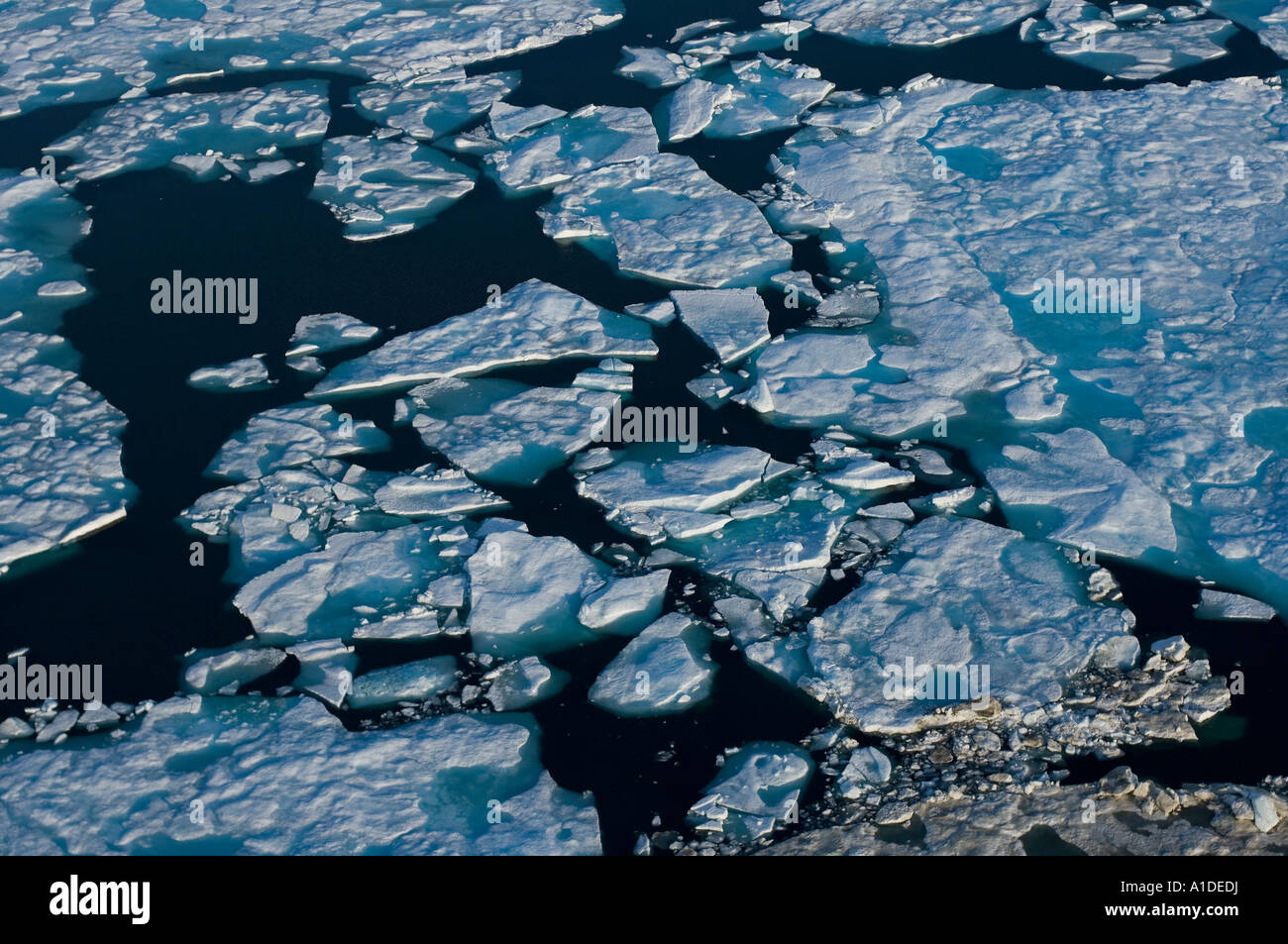 aerial of multi layer ice freshwater pans fduring spring breakup off ...