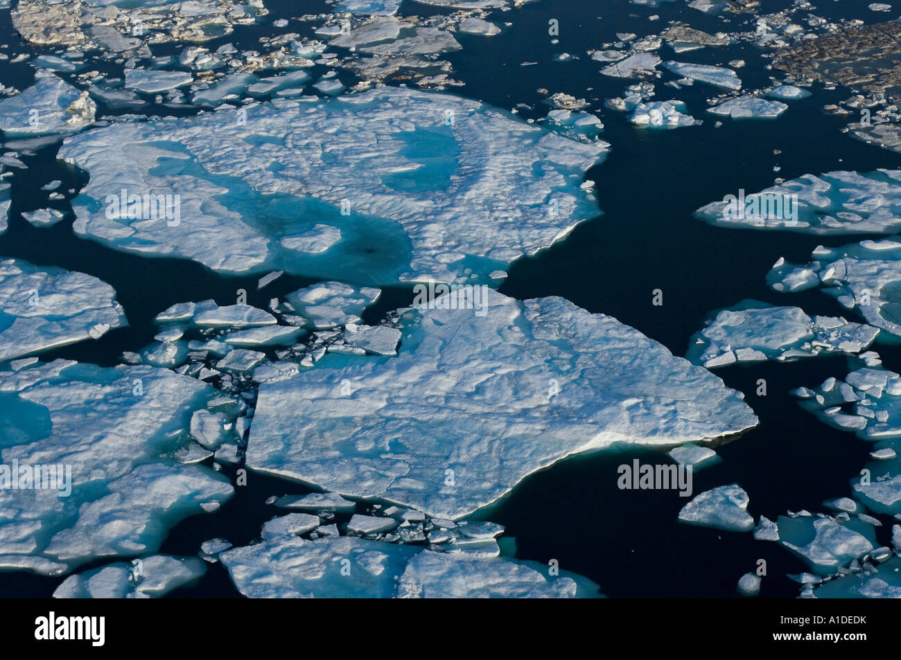 aerial of multi layer ice freshwater pans fduring spring breakup off ...