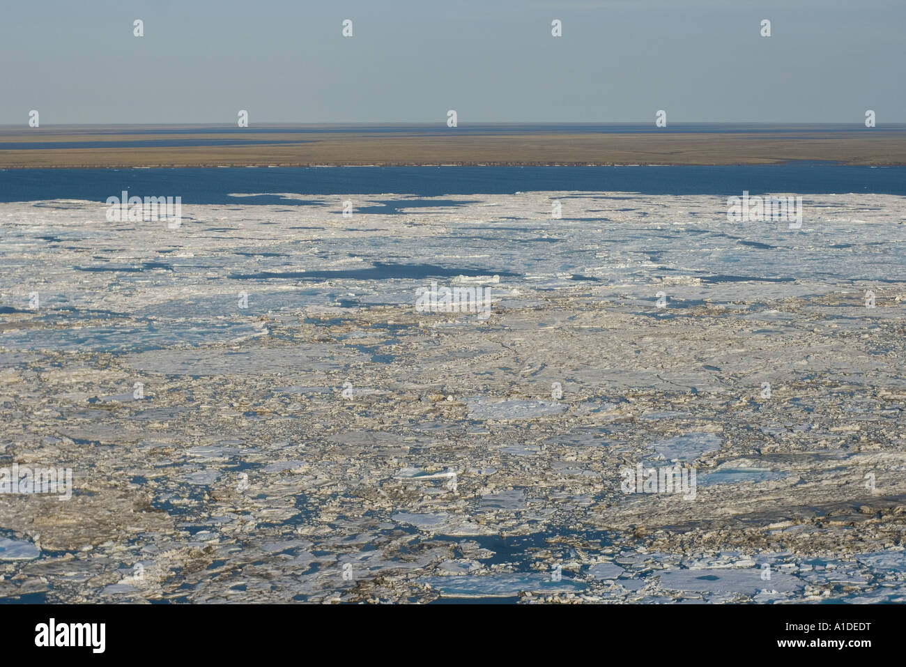 aerial of spring breakup of ice along the Arctic coast off the National ...