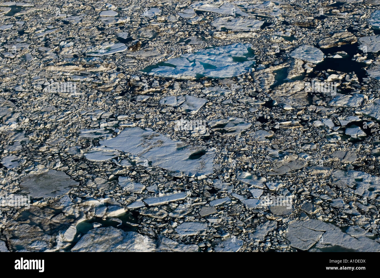 aerial of multi layer ice freshwater pans fduring spring breakup off ...