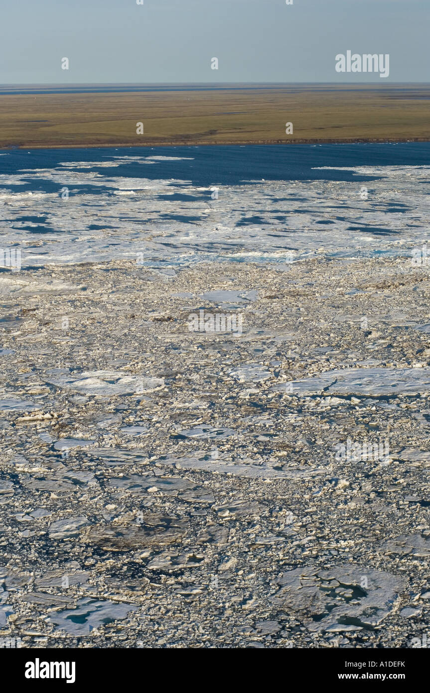 aerial of spring breakup of ice along the Arctic coast off the National ...