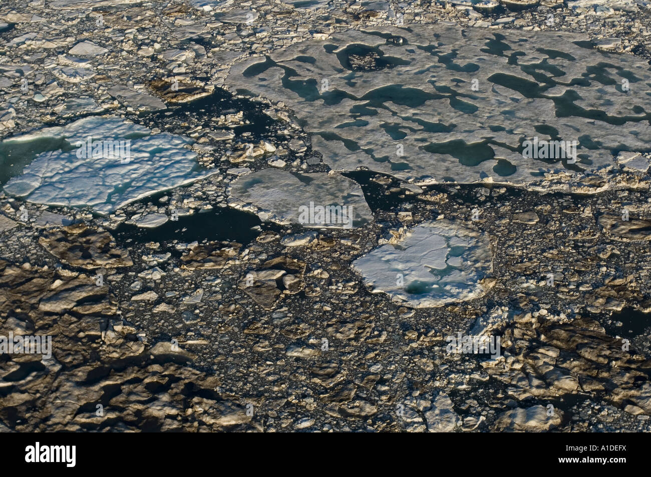 aerial of multi layer ice freshwater pans fduring spring breakup off ...