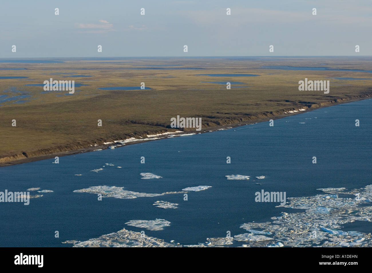 aerial of spring breakup of ice along the Arctic coast off the National ...