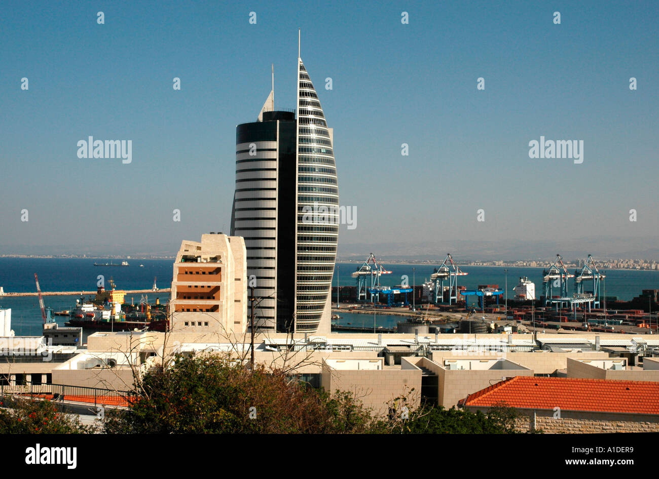 High rise modern building in Downtown Haifa, Israel. The Haifa port is ...
