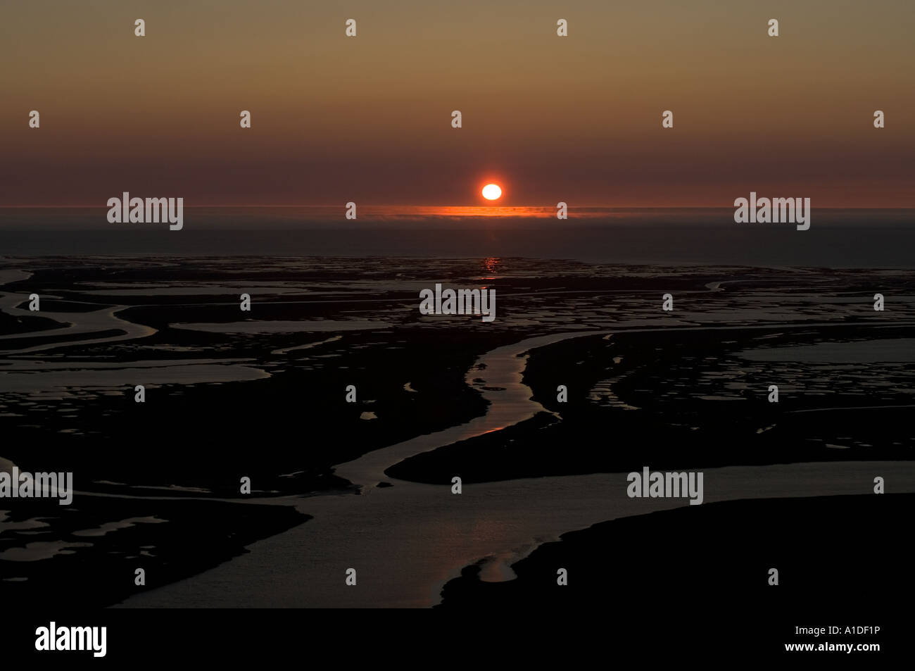 aerial of a sunset over the Colville River delta National Petroleum ...