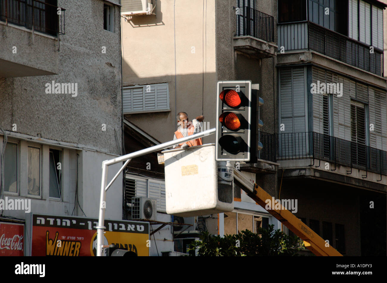 Workers Painting the traffic lights and poles Tel Aviv Israel November ...