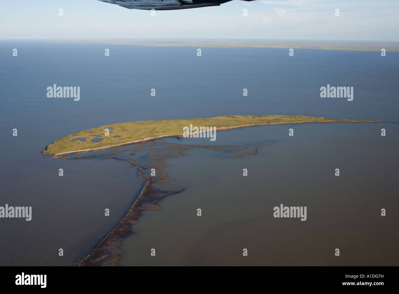 tundra landscape with freshwater ponds along the Arctic coast by the ...