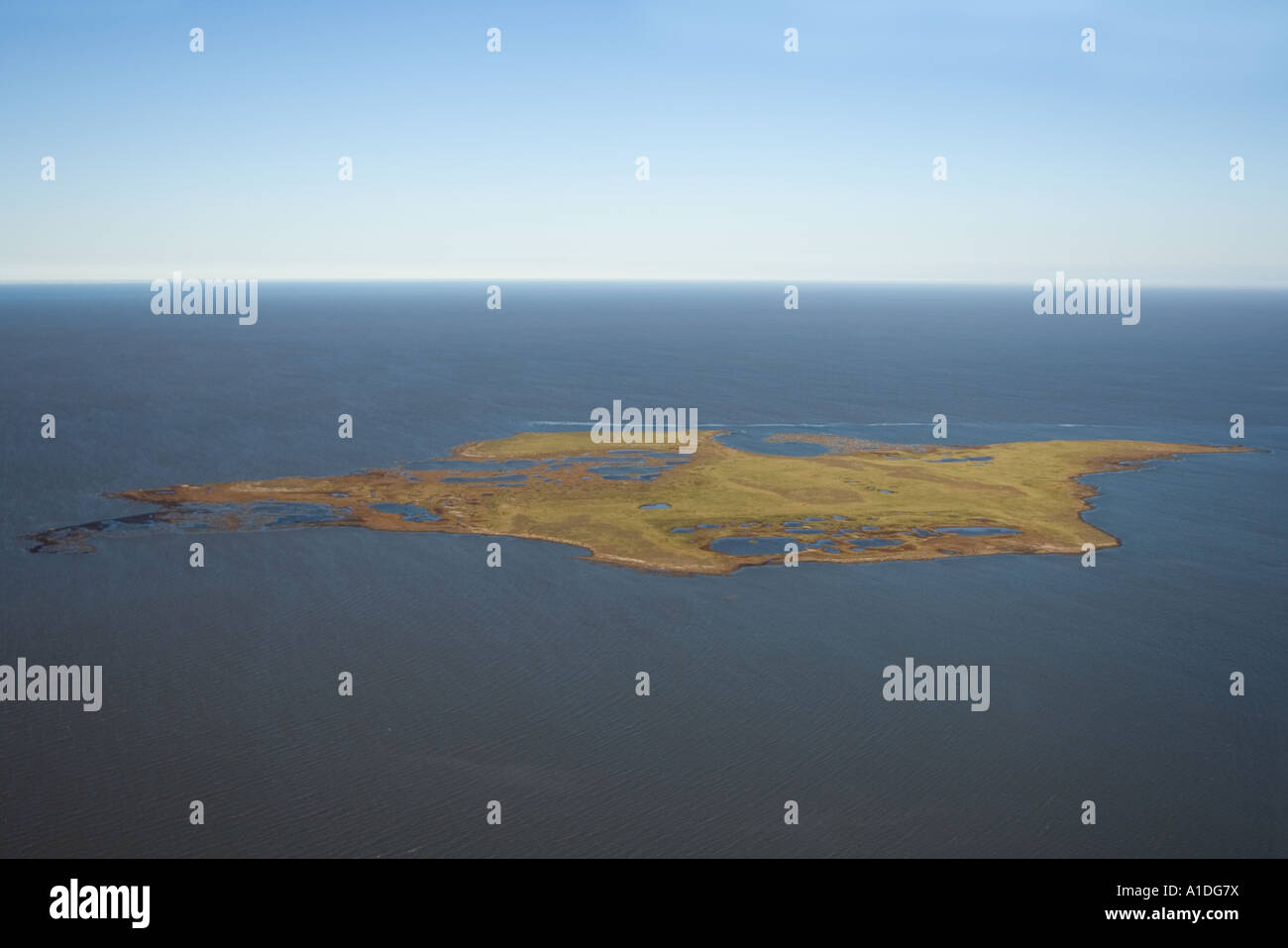 tundra landscape with freshwater ponds along the Arctic coast by the ...