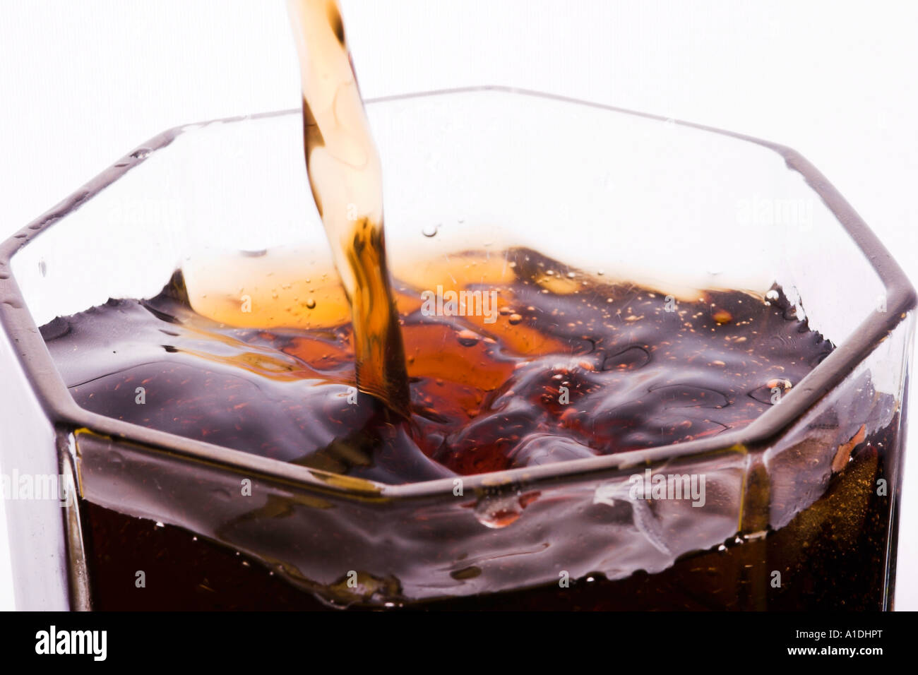 Pouring a coke Stock Photo - Alamy
