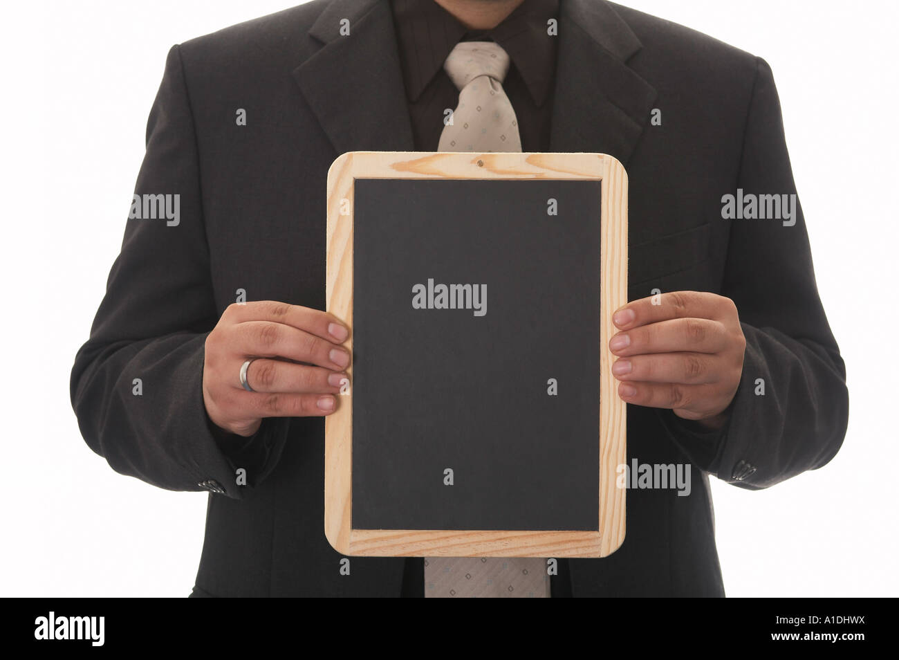 Businessman with a empty board Stock Photo - Alamy