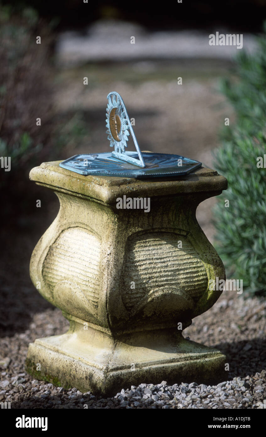 garden sundial on plinth Stock Photo - Alamy