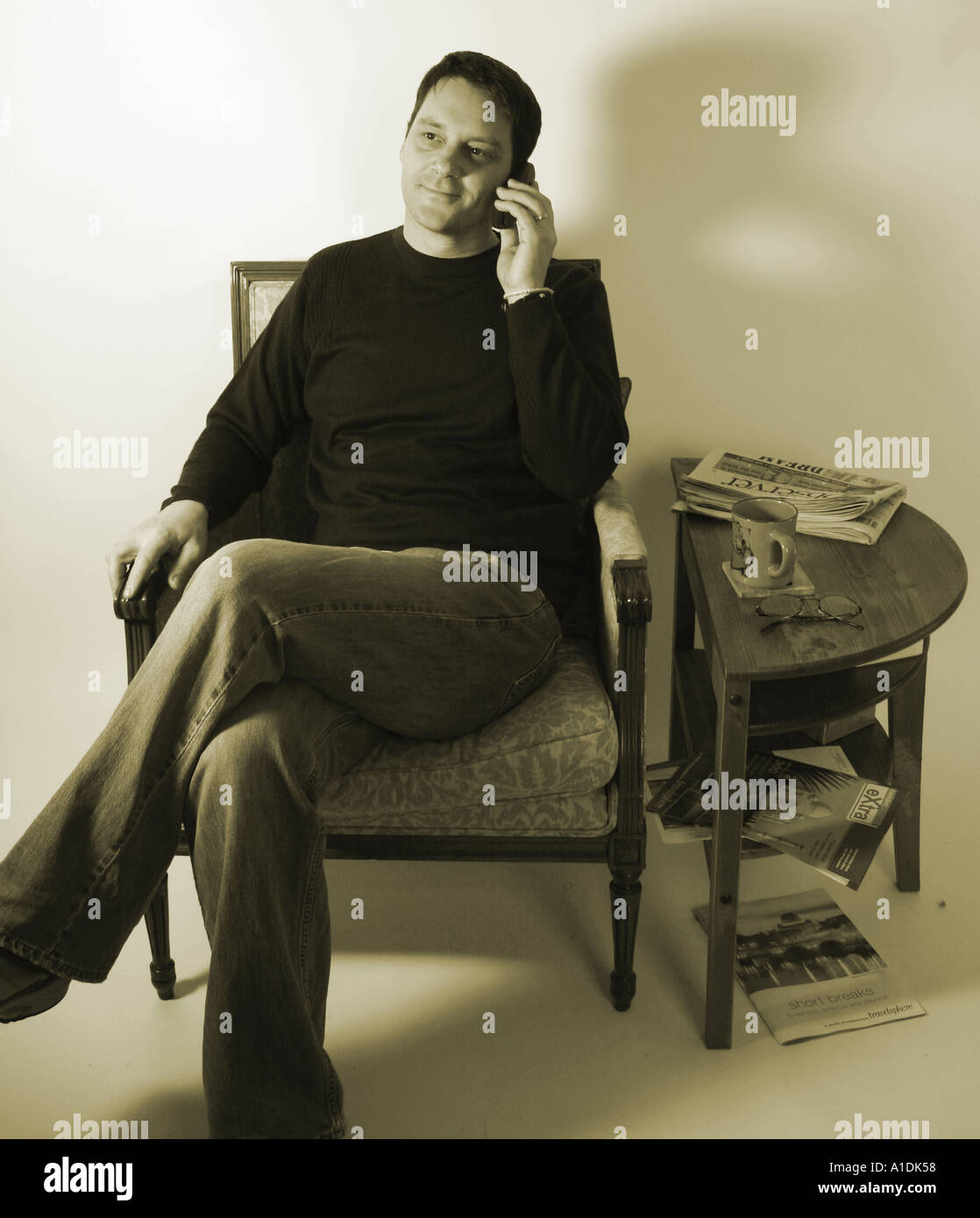 Man sat down side on hi-res stock photography and images - Alamy