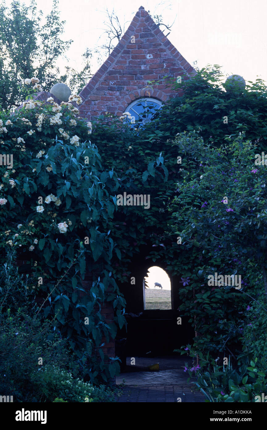 window looking from garden onto field with sheep Stock Photo - Alamy