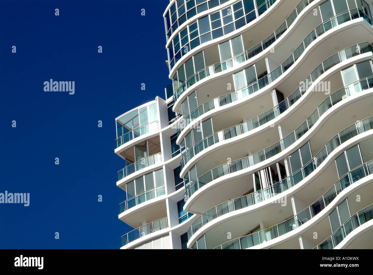 A modern white high rise buildng, photo by Bruce Miller Stock Photo - Alamy