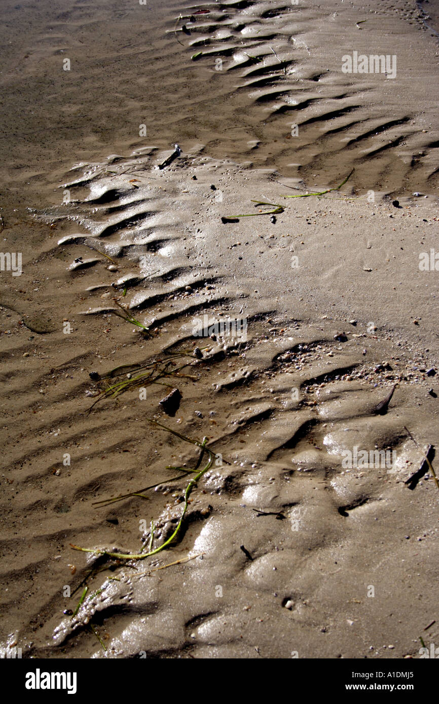 PATTERNS IN ROCK AND SAND CAUSED BY THE MOVEMENT OF THE OCEAN Stock ...