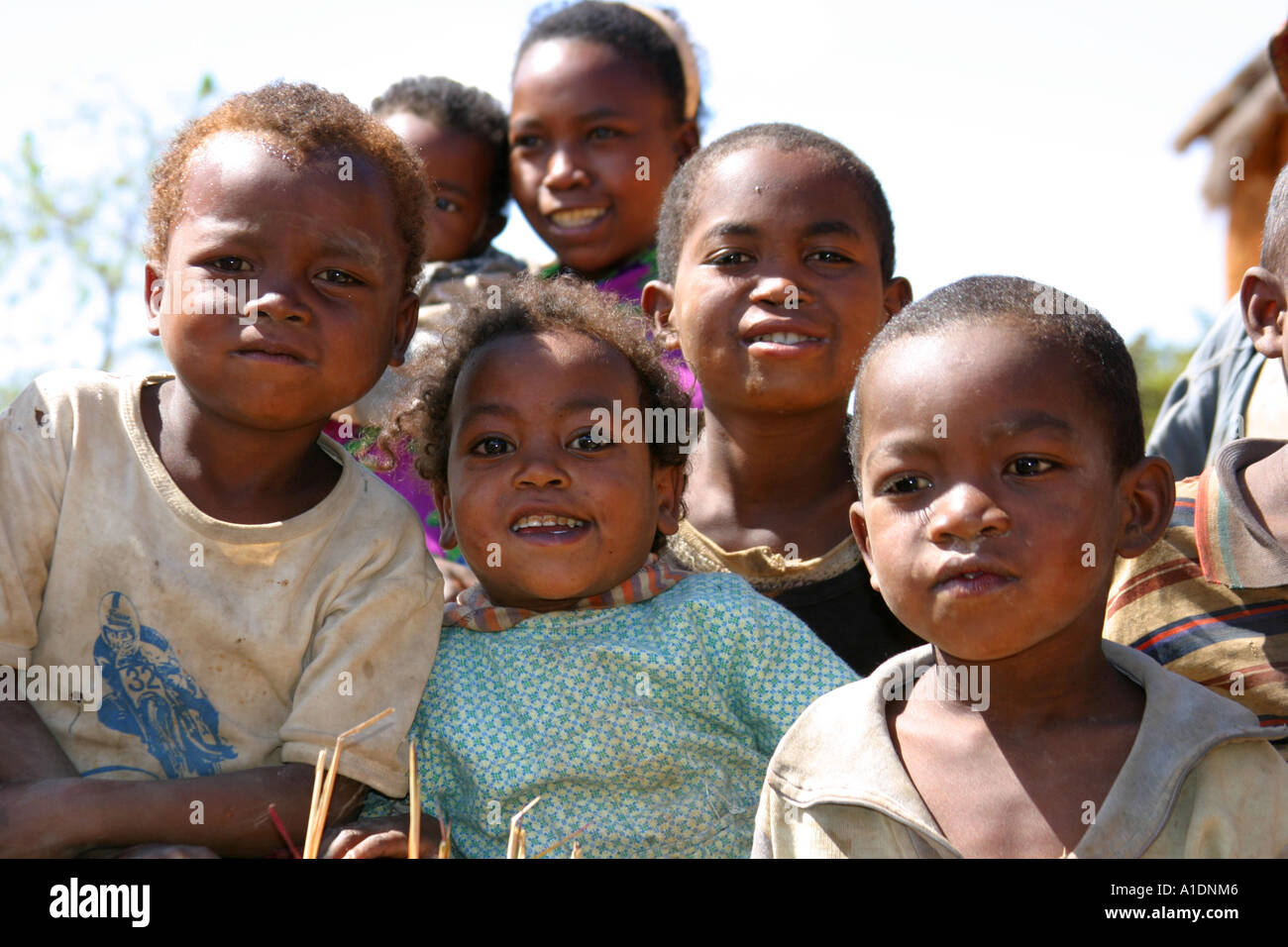 Curious village kids Stock Photo - Alamy