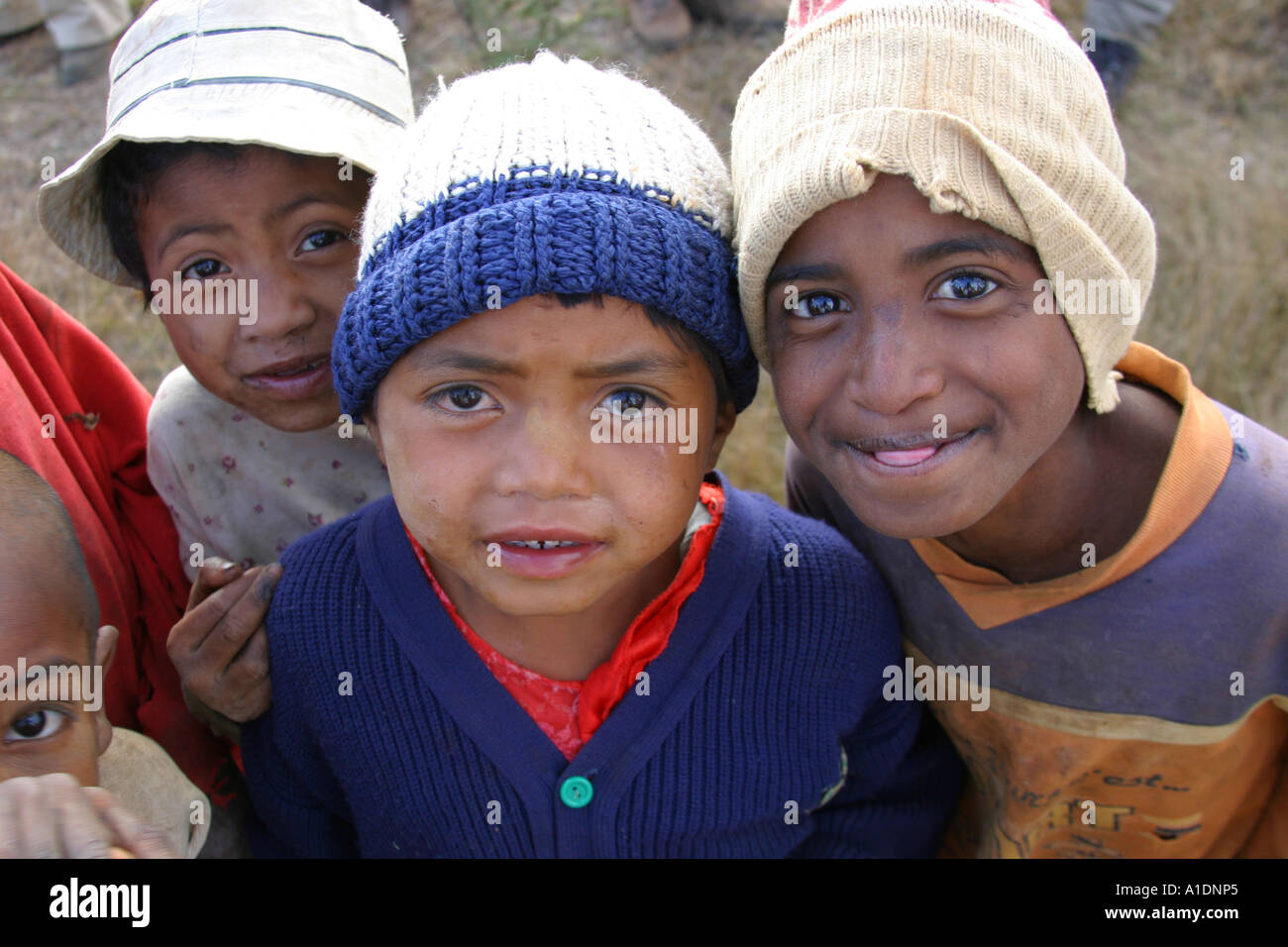Curious kids peering up Stock Photo - Alamy