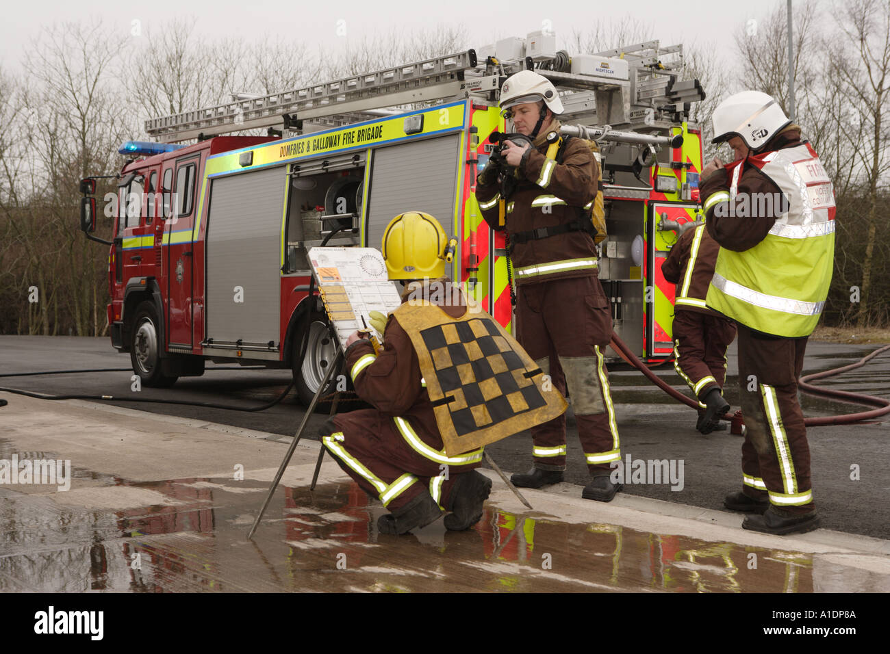 Fire Brigade and fire engine control position Stock Photo - Alamy