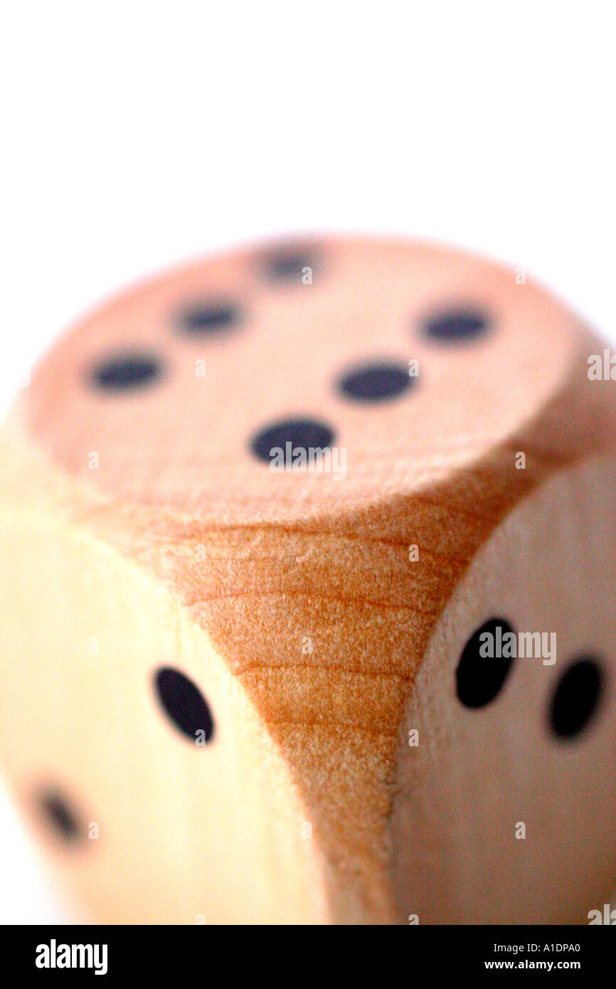Wooden die in studio Stock Photo - Alamy