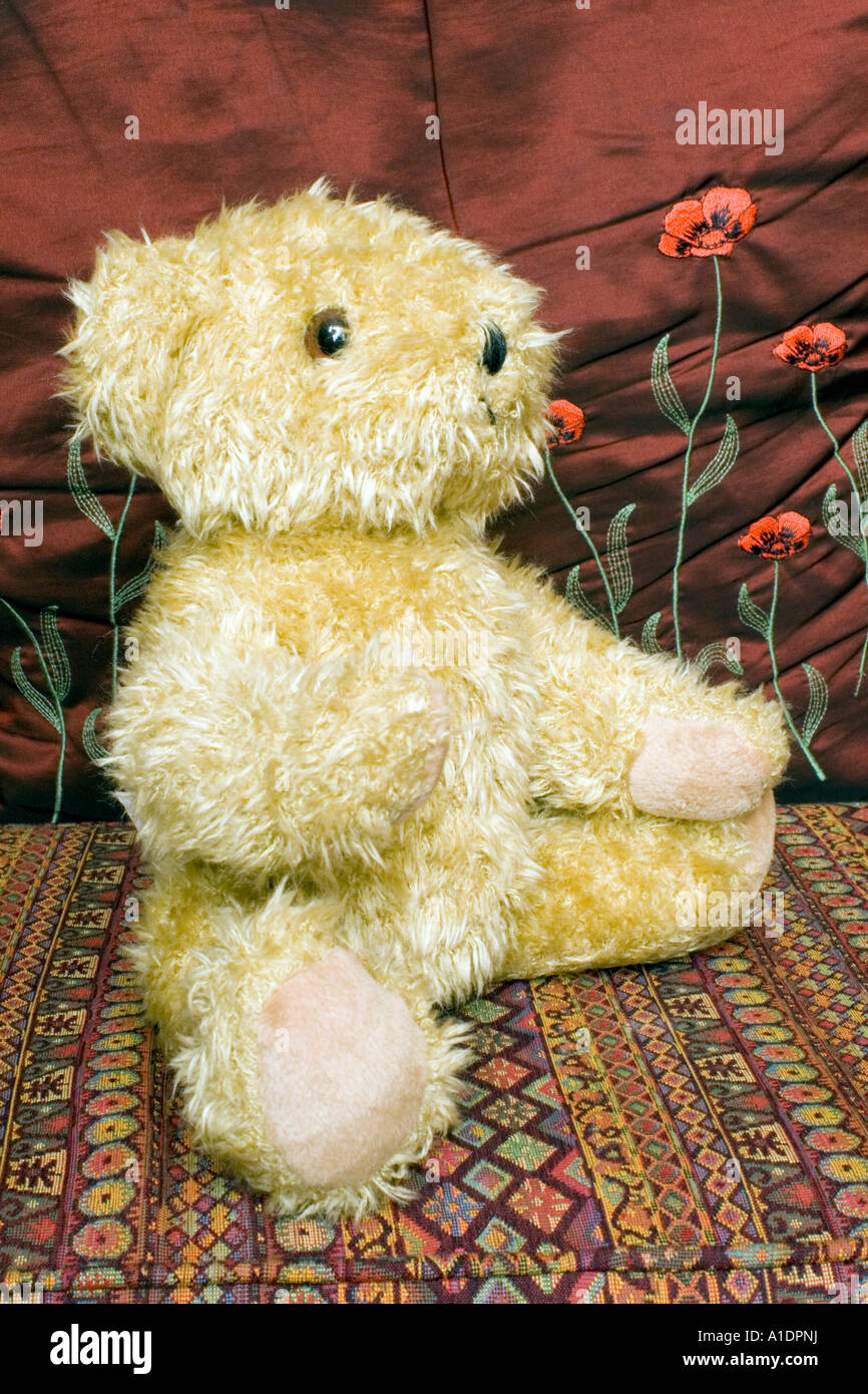 Teddy Bear Sitting On A Flowered Chair In Kent, England Stock Photo - Alamy