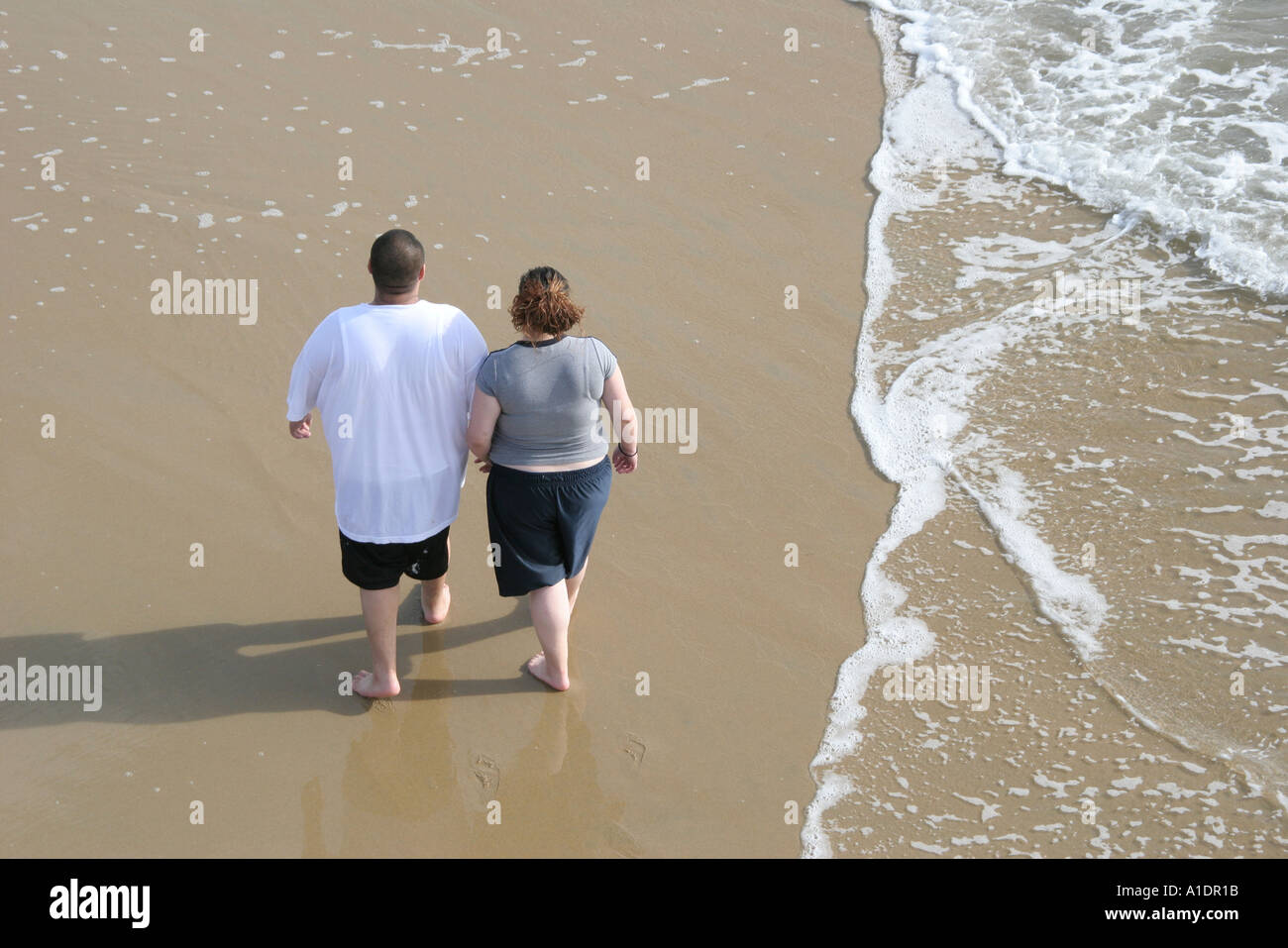 Fat couple beach hi-res stock photography and images - Alamy