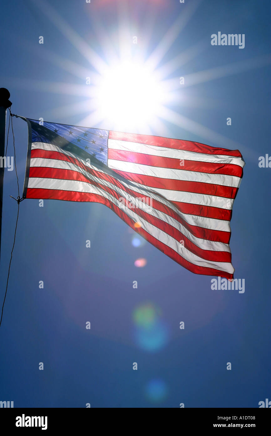 The American Flag lit from behind from the sun Stock Photo - Alamy