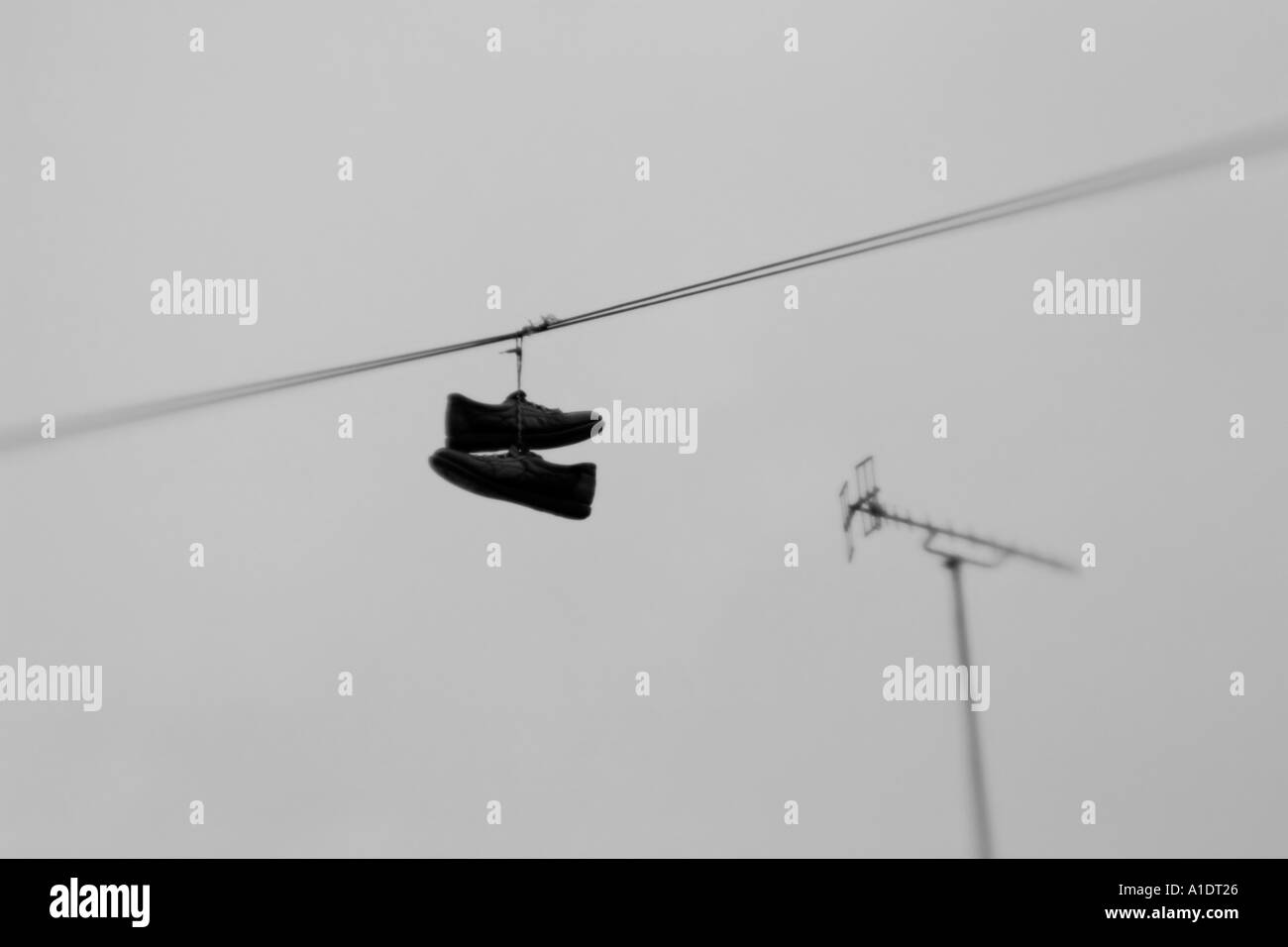shoes telephone wire aerial Stock Photo - Alamy