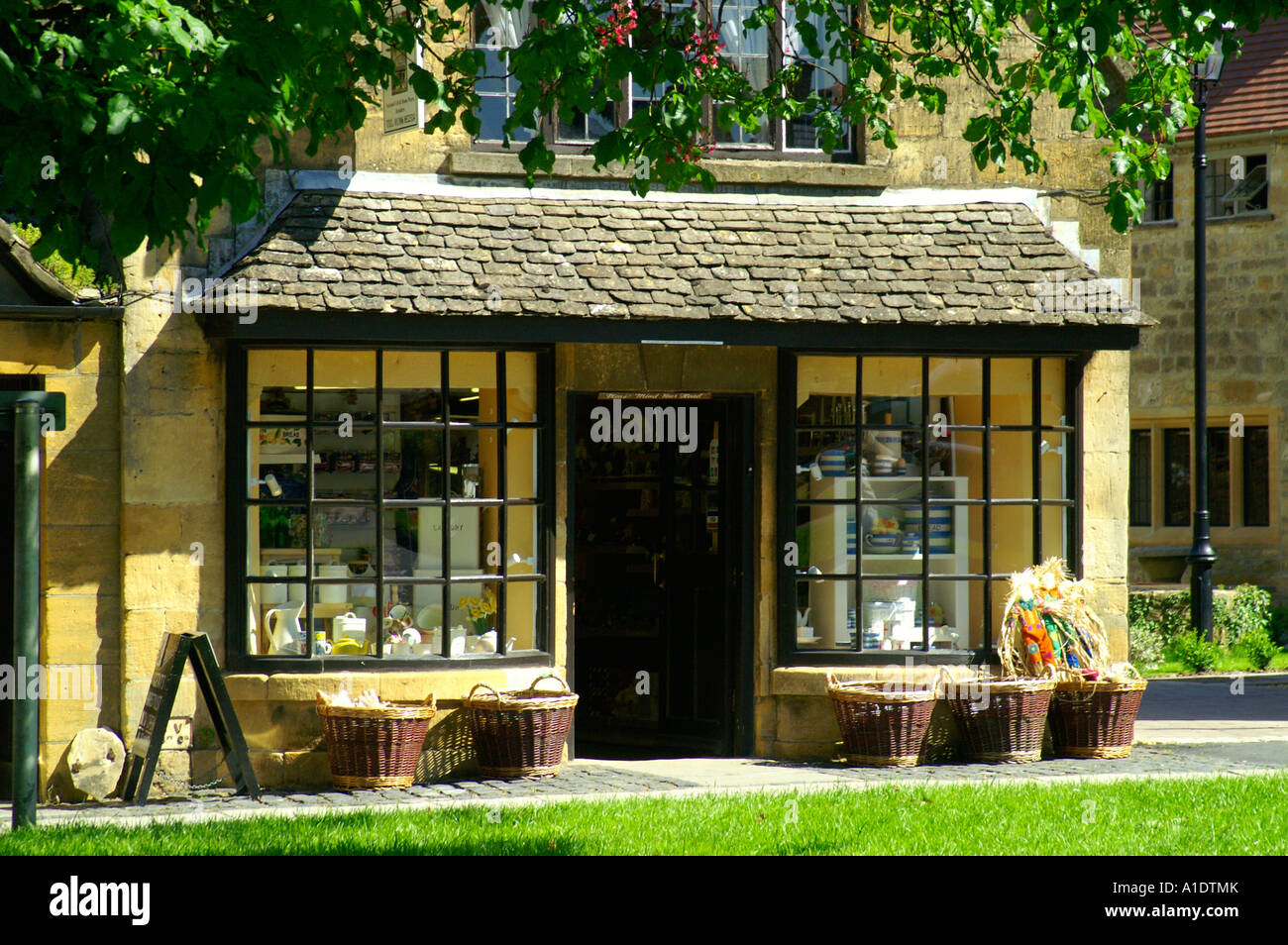 Facade and tiled window display gate of house in sleepy village ...