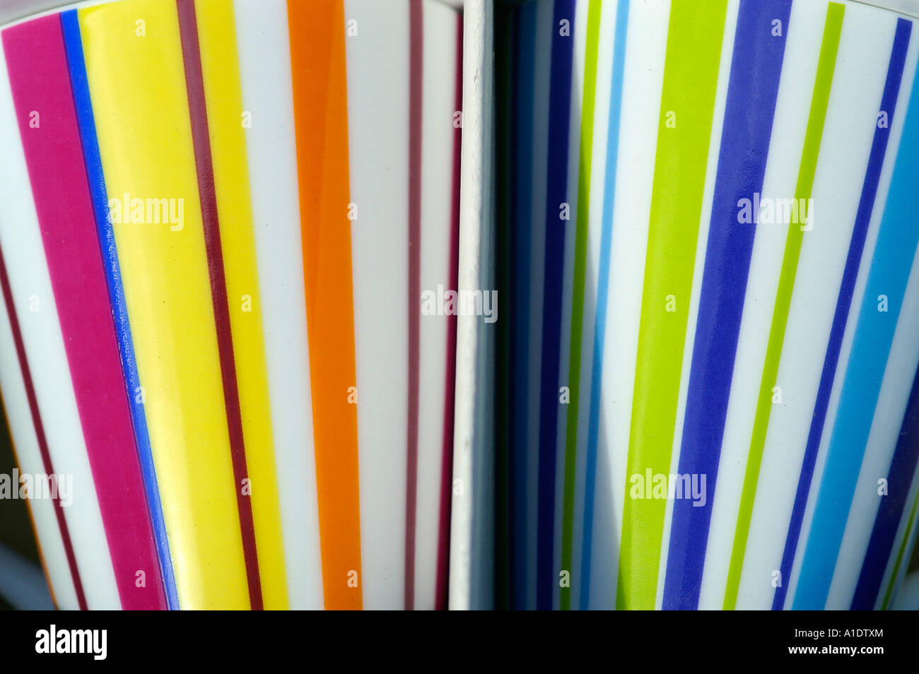 Ceramic pottery strip line colourful design cup mug Stock Photo - Alamy