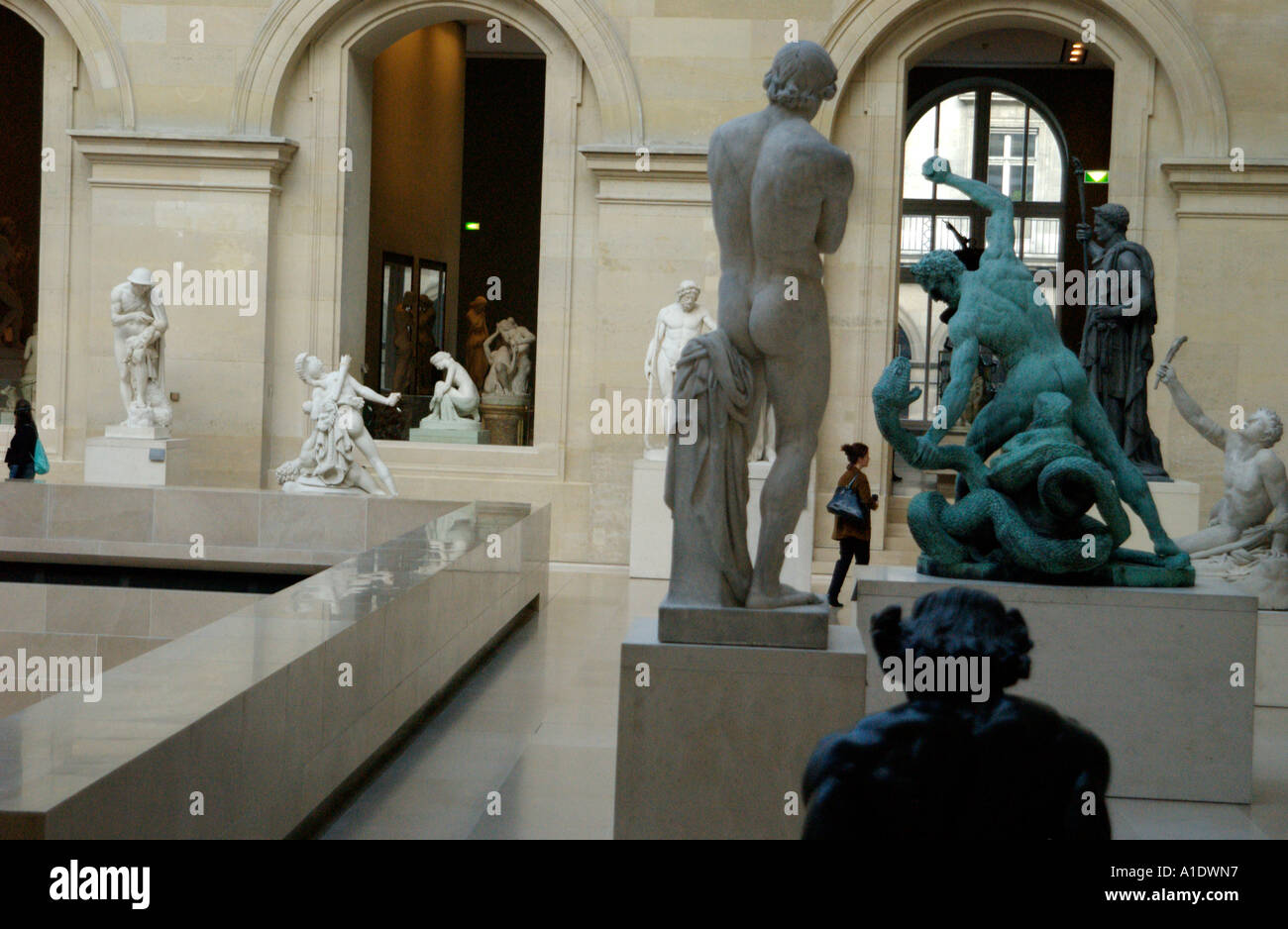 Man fight snake sculpture louvre hi-res stock photography and images ...
