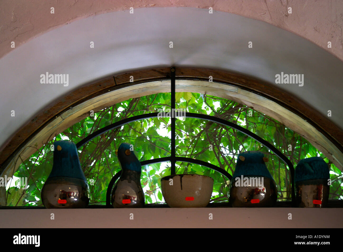 Gallery art pottery display in window indoors, Kazimierz artistic part ...