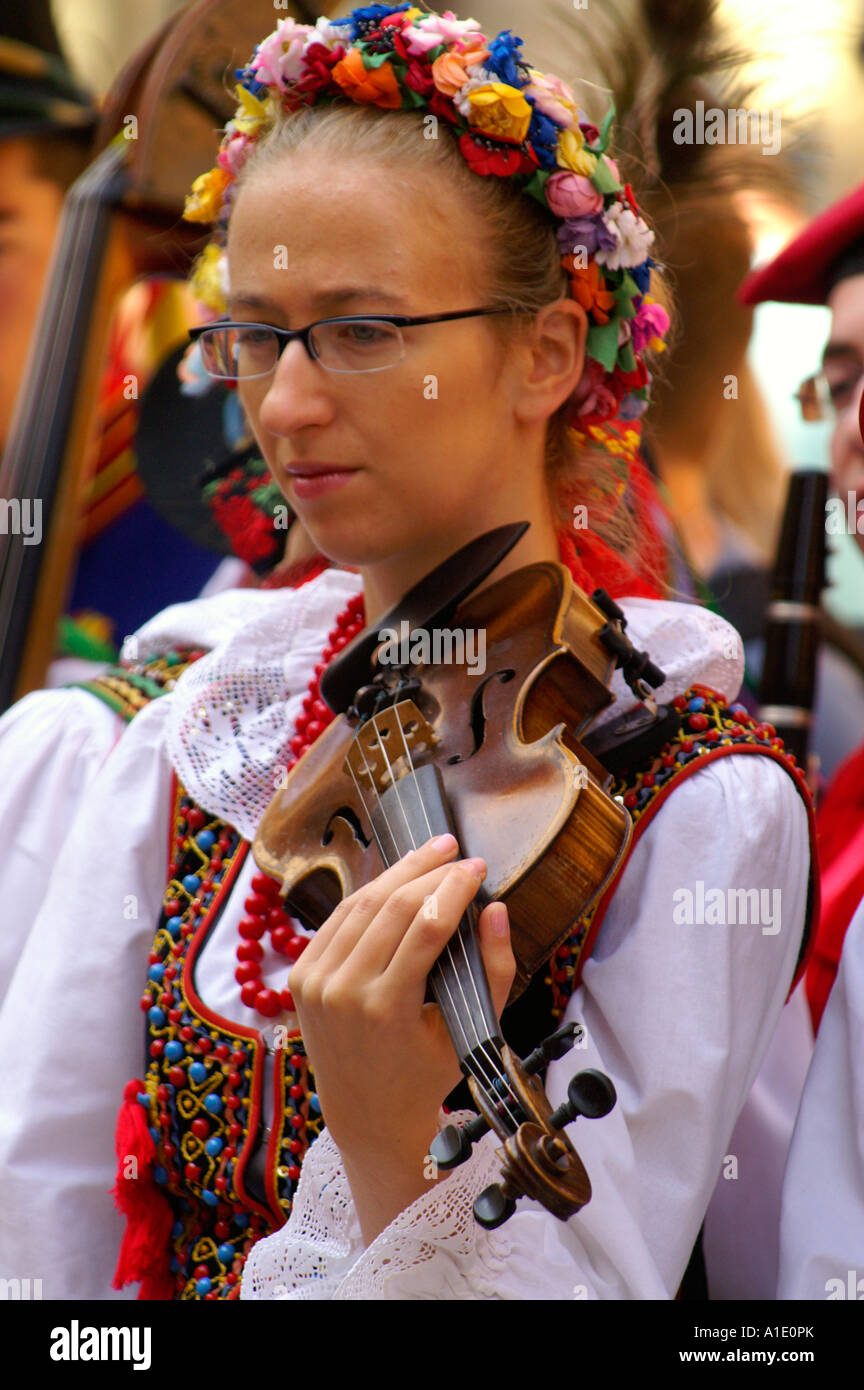 Young woman girl teenager violin player in historic national polish ...
