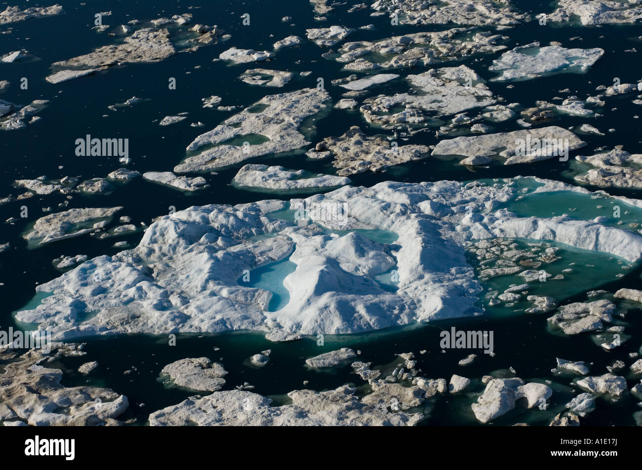 aerial of multi layer ice freshwater pans during spring breakup along ...