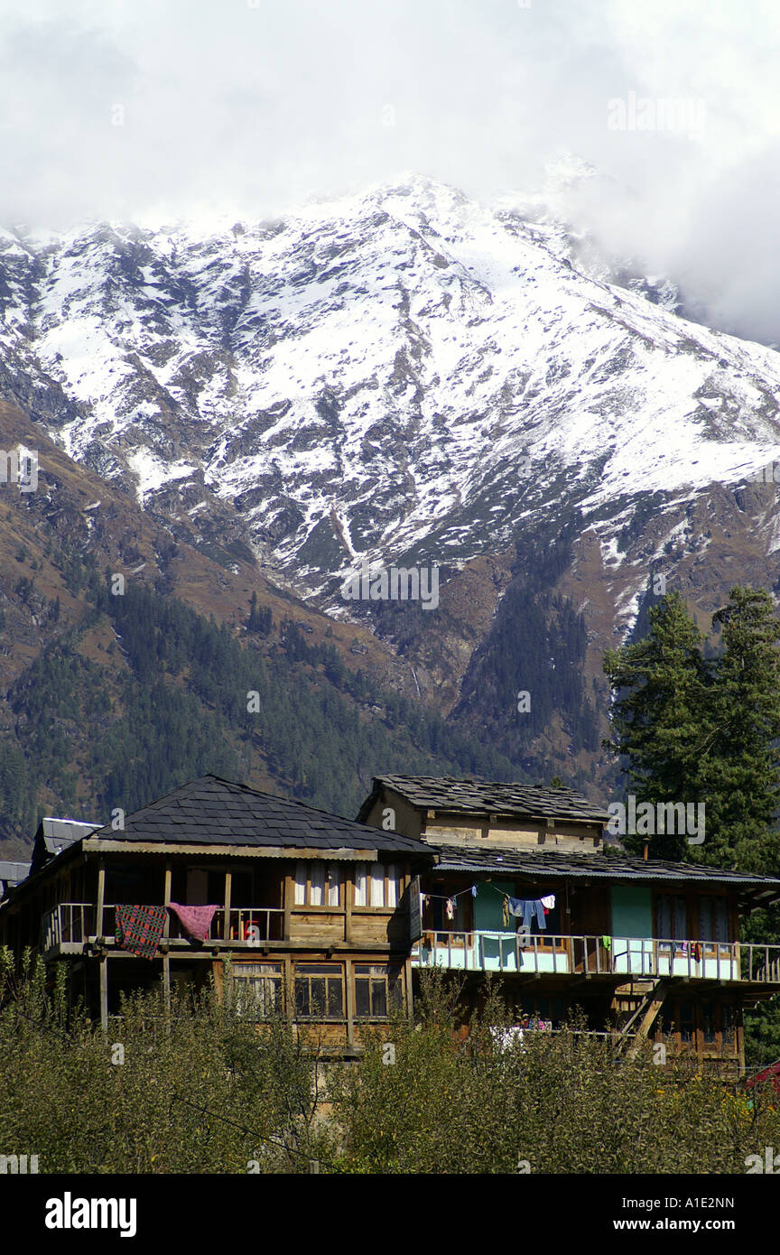 Traditional wooden house dwelling in Kalga village under snow covered ...