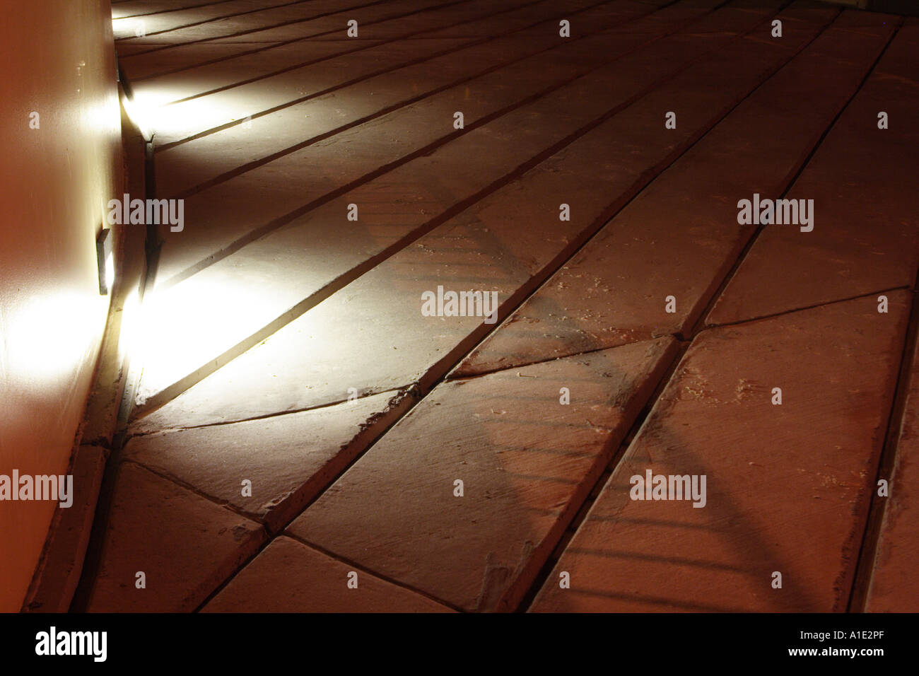 PATHWAY LIT AT NIGHT WITH CONVERGING LINES Stock Photo - Alamy