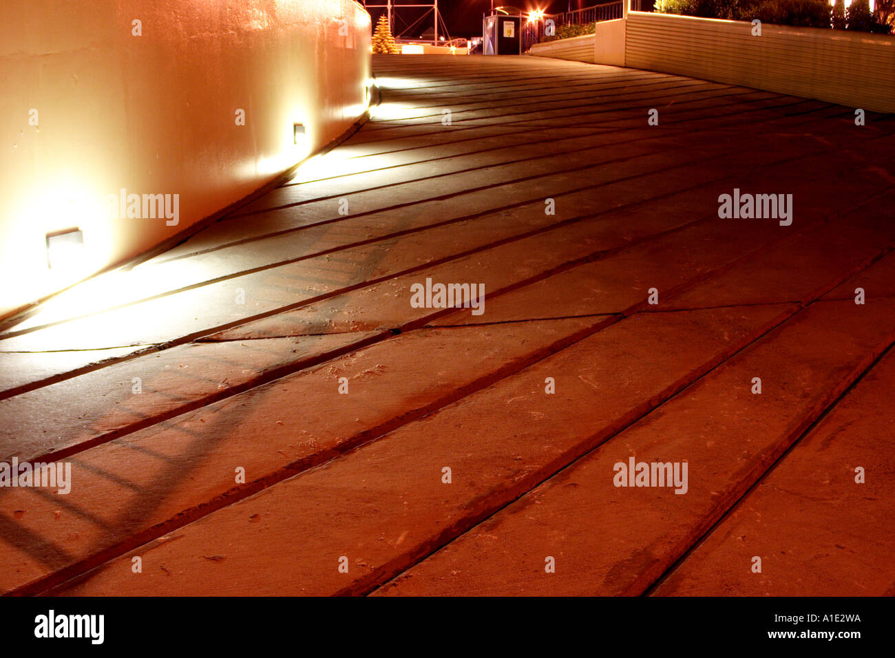 PATHWAY LIT AT NIGHT WITH CONVERGING LINES Stock Photo - Alamy