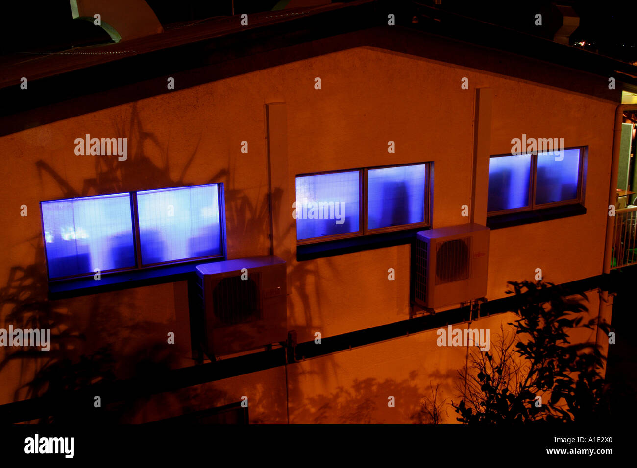 ELECTRIC BLUE WINDOWS IN A BUILDING Stock Photo - Alamy