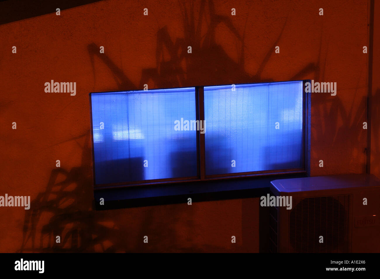 ELECTRIC BLUE WINDOWS IN A BUILDING Stock Photo - Alamy